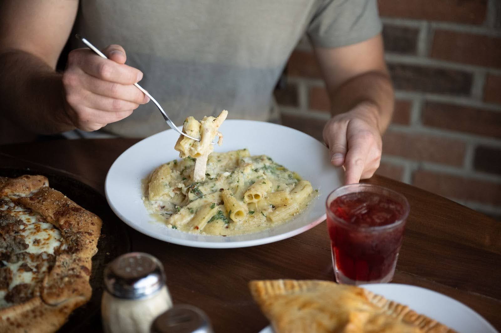 Pizza vs. Pasta: The Italian Food Showdown | Green Mill Restaurant & Bar